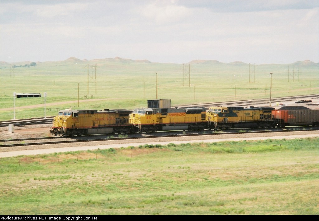 UP 7004, 8122 & CNW 8831